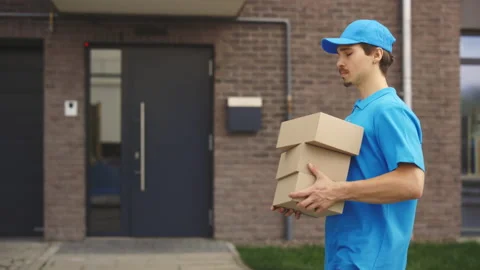 Side View of the Caucasian Male Postman ... | Stock Video | Pond5