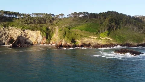 Side view from caves in the sea in Playa... | Stock Video | Pond5