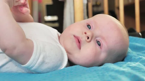 Side view close portrait of adorable new... | Stock Video | Pond5