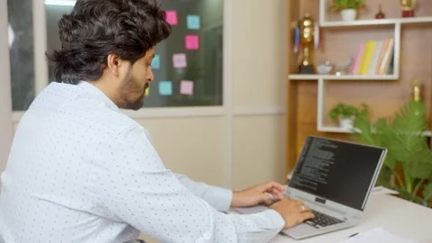 Side view of Corporate IT employe coding... | Stock Video | Pond5