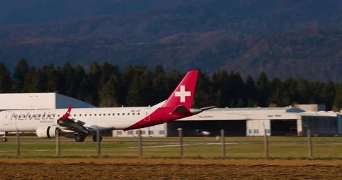 Side view of Embraer E190LR airplane lan... | Stock Video | Pond5