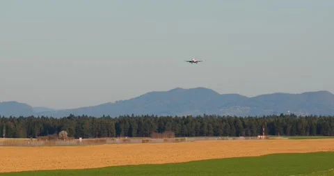 Side view of Embraer E190LR airplane lan... | Stock Video | Pond5