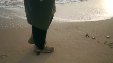 Side view of female feet in boots walkin... | Stock Video | Pond5