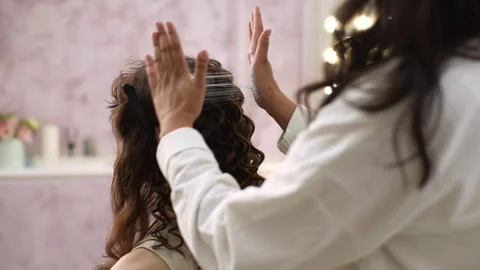 Side view of female hairdresser rubbing ... | Stock Video | Pond5