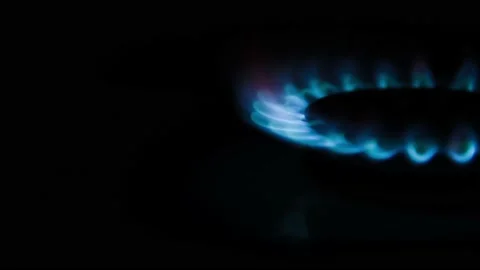 Side view of the flame from gas stove wi... | Stock Video | Pond5