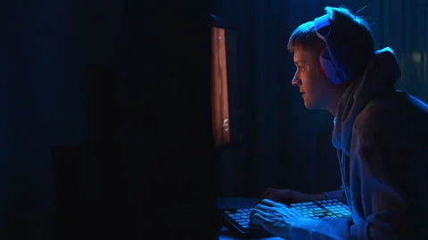 Side view of focused gamer male wearing ... | Stock Video | Pond5