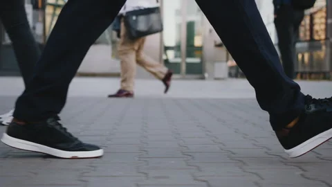 Side view follow male feet steps crossin... | Stock Video | Pond5