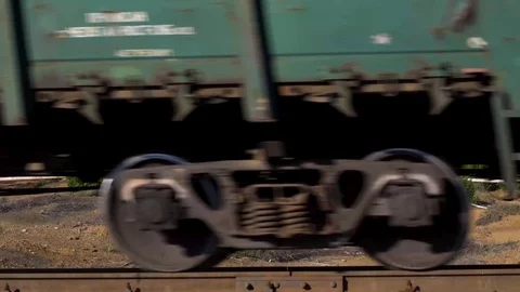 Side view of a freight train moving on r... | Stock Video | Pond5