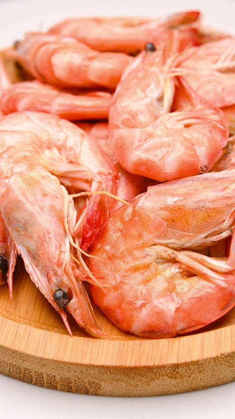 side view fresh cooked shrimps rotating ... | Stock Video | Pond5