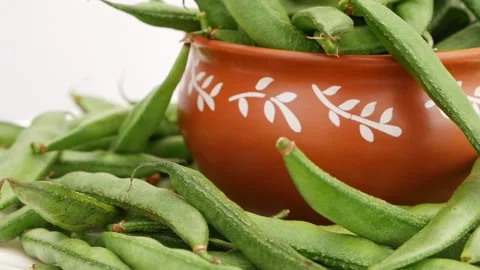 Side view of green beans in bowl. Green ... | Stock Video | Pond5