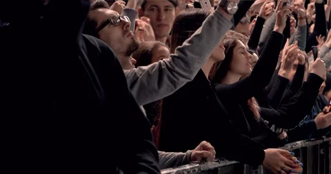 Side view huge crowd jumping and cheerin... | Stock Video | Pond5