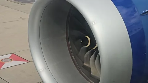 Side view of jet engine turbines spinnin... | Stock Video | Pond5