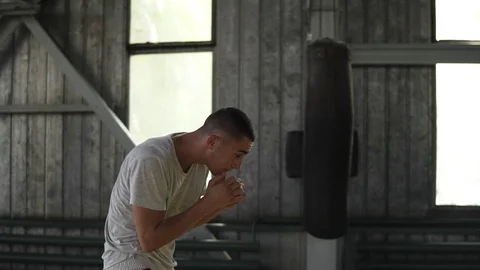 Side view of a male boxer warming up. Tw... | Stock Video | Pond5
