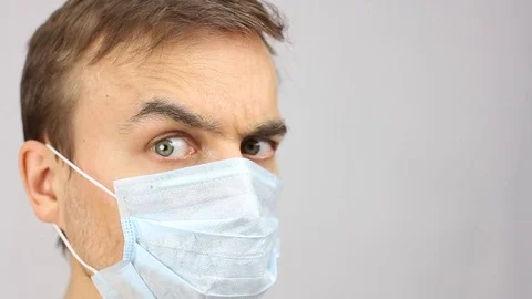 side view on male face in medical mask, ... | Stock Video | Pond5