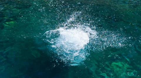 side view man makes high dive from boat ... | Stock Video | Pond5