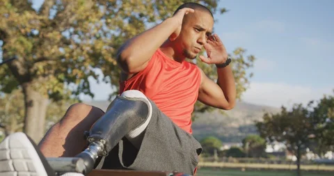 Side view man with prosthetic leg doing ... | Stock Video | Pond5