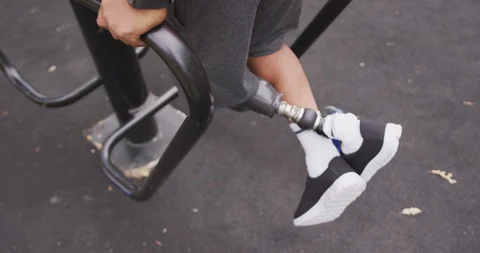 Side view man with prosthetic leg exerci... | Stock Video | Pond5