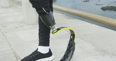 Side view man with prosthetic leg standi... | Stock Video | Pond5
