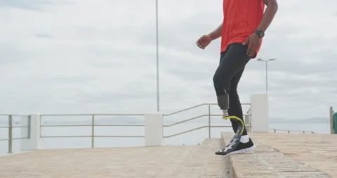 Side view man with prosthetic leg walkin... | Stock Video | Pond5