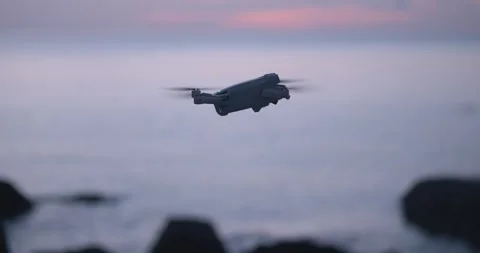 Side view of a modern quadcopter drone h... | Stock Video | Pond5