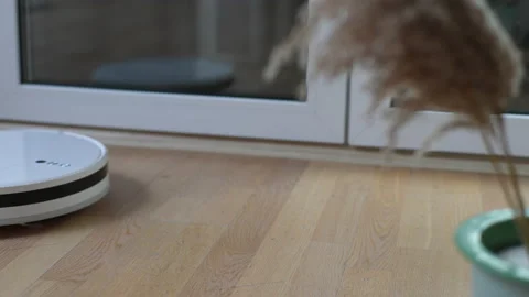 Side view of modern robotic vacuum clean... | Stock Video | Pond5