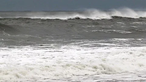 Side view of ocean waves from a storm on... | Stock Video | Pond5