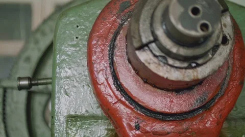 Side view of old screw press machine in ... | Stock Video | Pond5