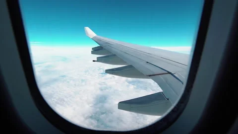 Side view from a plane window of the air... | Stock Video | Pond5
