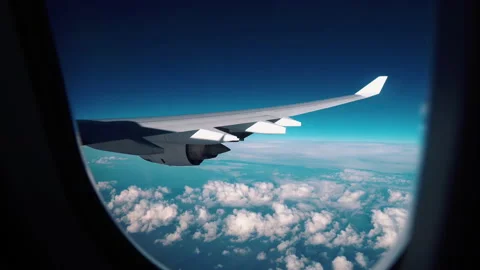 Side view from a plane window of the air... | Stock Video | Pond5