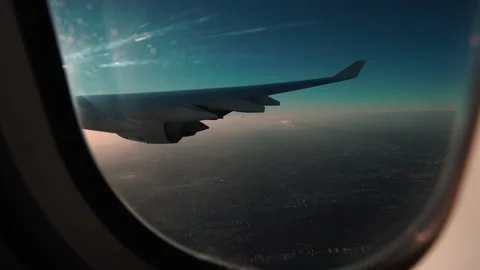 Side view from a plane window of the air... | Stock Video | Pond5