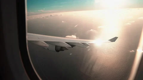 Side view from a plane window of the air... | Stock Video | Pond5