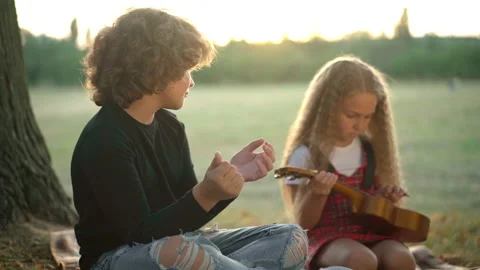 Side view positive boy clapping as blurr... | Stock Video | Pond5