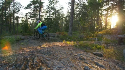 Side view of pro bike rider passing, sta... | Stock Video | Pond5