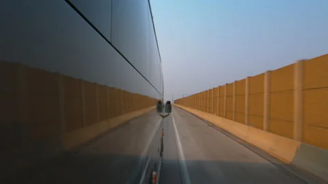 Side view of a public bus, shuttle, or s... | Stock Video | Pond5