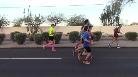 Side view of runners participating in a ... | Stock Video | Pond5