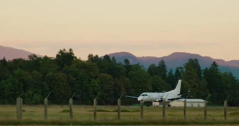Side view of Saab 340A(F) vacating the r... | Stock Video | Pond5