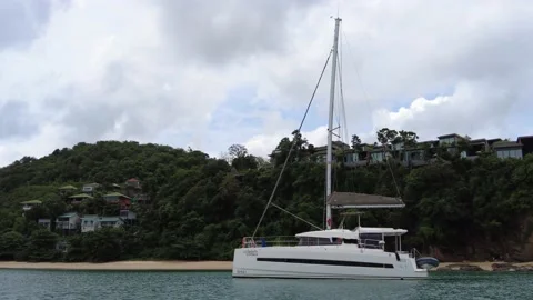 side view of a sailing catamaran against... | Stock Video | Pond5