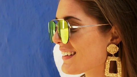 Side View Shot of Female Model with Earr... | Stock Video | Pond5