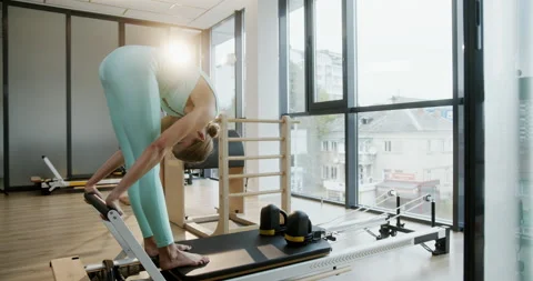 Side view of slim woman in turquoise leo... | Stock Video | Pond5