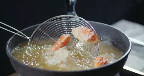Side View Slow Motion Deep Frying King C... | Stock Video | Pond5