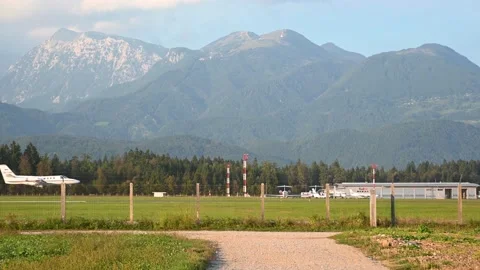 Side view of small passenger plane takin... | Stock Video | Pond5