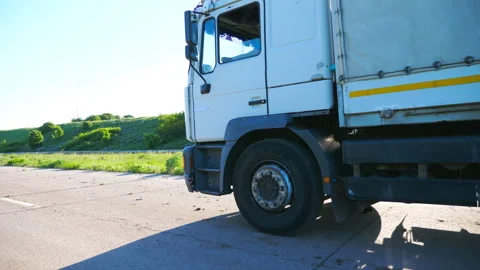 Side view of truck with cargo trailer dr... | Stock Video | Pond5