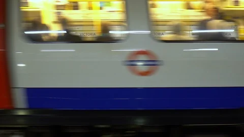 Side View of Tube Train Arriving at Unde... | Stock Video | Pond5