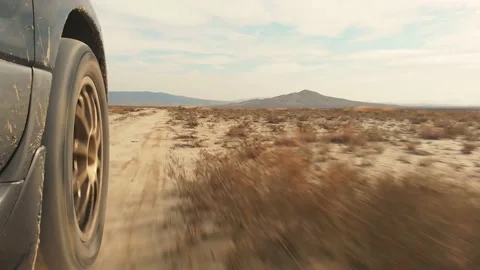 Side view of wheel spinning in fAst moti... | Stock Video | Pond5