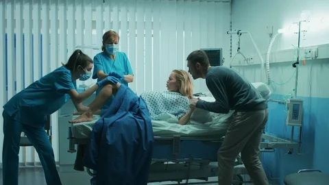 Side View of Woman Giving Birth in Hospi... | Stock Video | Pond5