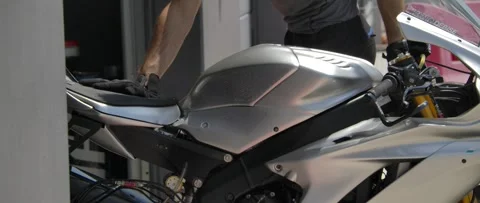 Side view of a Yamaha R6 getting pushed ... | Stock Video | Pond5