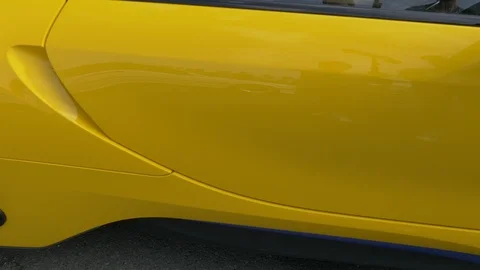 Side view of a yellow BMW i8 | Stock Video | Pond5
