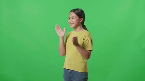 Side View Of Young Asian Kid Girl Clappi... | Stock Video | Pond5