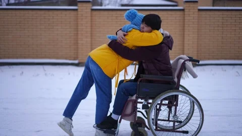Side view young Asian man rolling wheelc... | Stock Video | Pond5