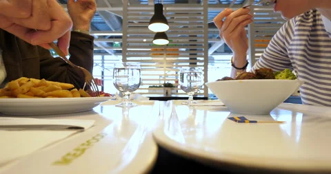 Side view of young couple family eating ... | Stock Video | Pond5